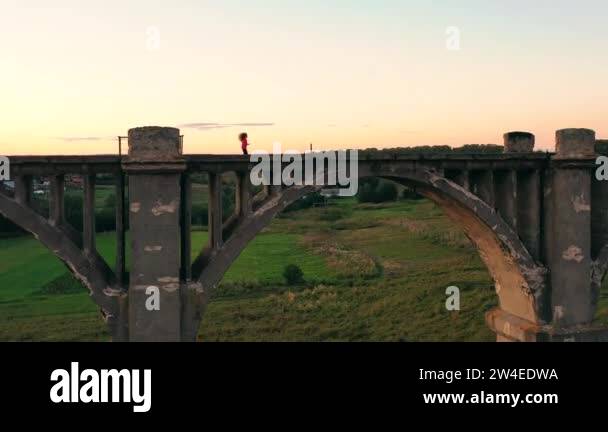 Lady on a bridge Stock Videos & Footage - HD and 4K Video Clips - Alamy