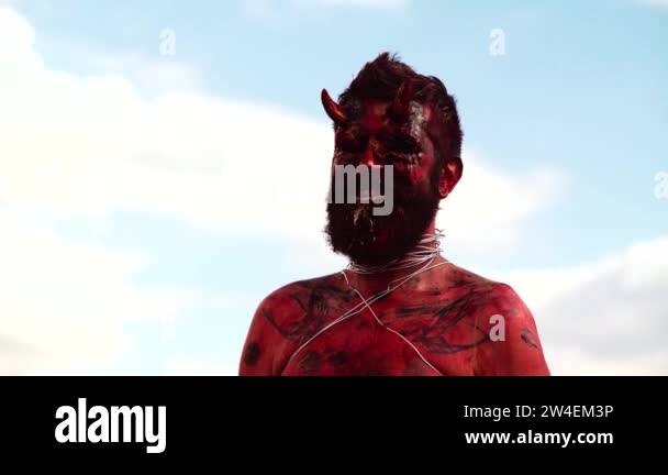 Close-up devil Halloween face. Devil head with horns in blood, bloody ...