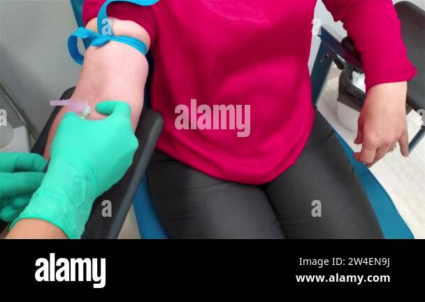 Blood draw, a needle is used to take blood from a vein Stock Video ...