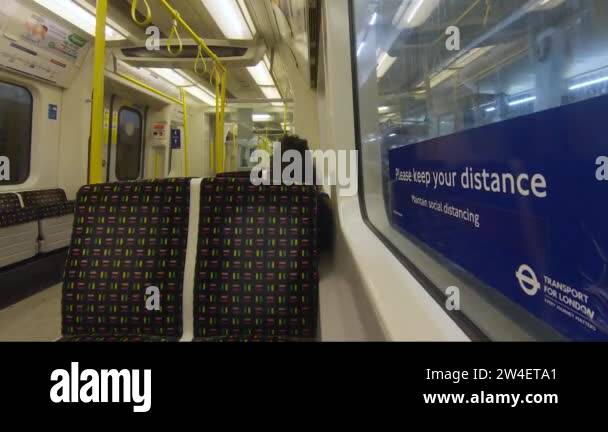 Keep Your Distance Signage On Train Window As it Leaves Station. Follow ...