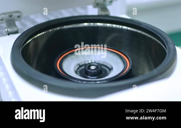 Close up shot of blood samples spinning in centrifuge during ...