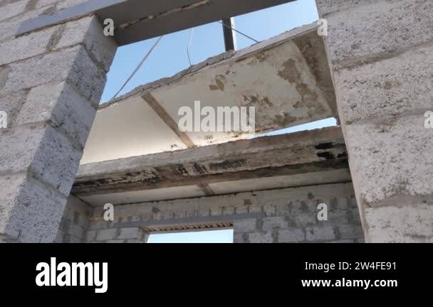 Installation Concrete Slab on Load-Bearing Walls of the House Under ...