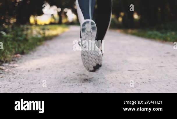 Unrecognizable Runner Woman Feet Running In The Park Exercising ...