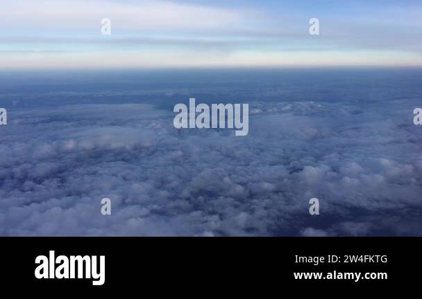 Amazing footage of aerial view above the clouds. Flying over the clouds ...
