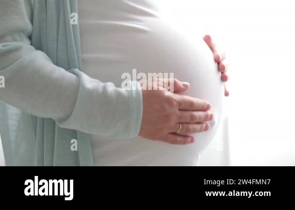 4k Pregnant Expectant Mother Caressing Her Belly Woman Hands Touching