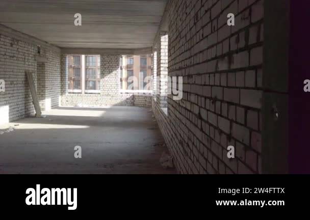 Unfinished house construction. White brick on the background of the ...