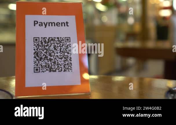 QR code pay. To use a QR code payment Stock Video Footage - Alamy