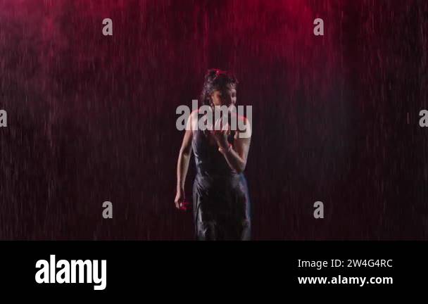 Flamenco. A passionate wet woman dances a fiery Spanish dance in the ...
