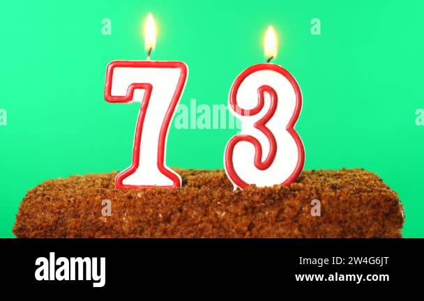 Cake with the number 73 lighted candle. Chroma key. Green Screen ...