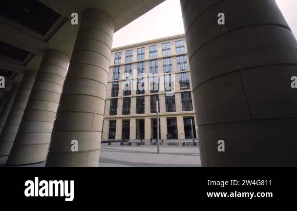 Beautiful colonnade of modern business building. Action. External ...