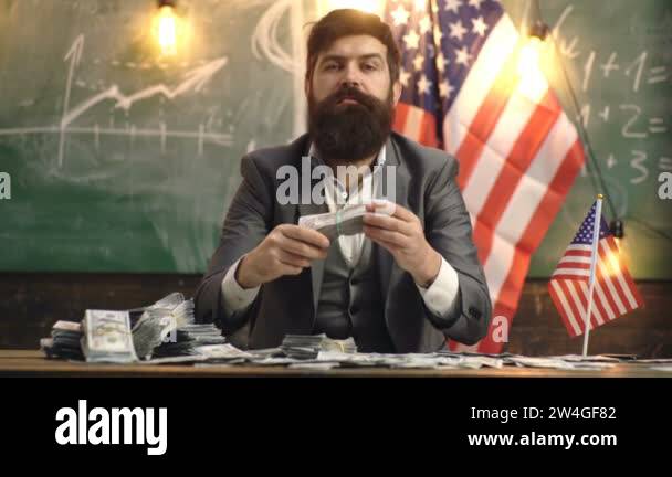 Businessman holding dollar money and giving money. Banker with money in ...