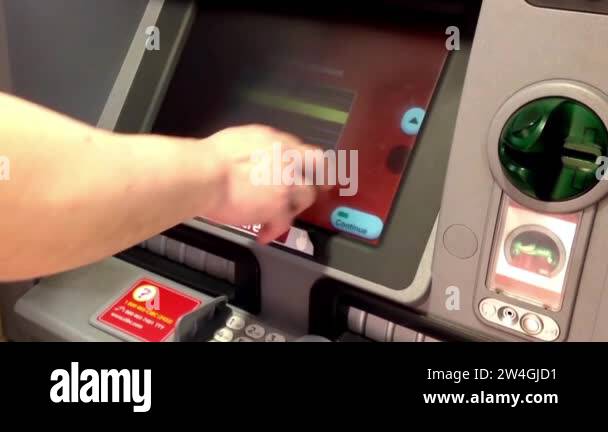Man depositing cheque at ATM machine inside Cibc bank Stock Video ...