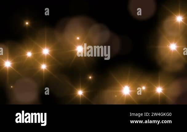 Camera flash light on black background. Orange lights. Loop animation ...