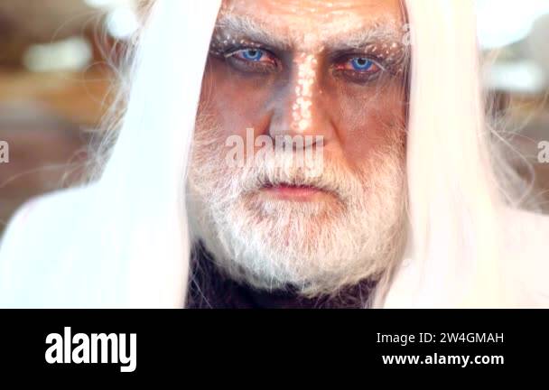 Close up face of witcher scary man. Magic and witchcraft with spell and ...