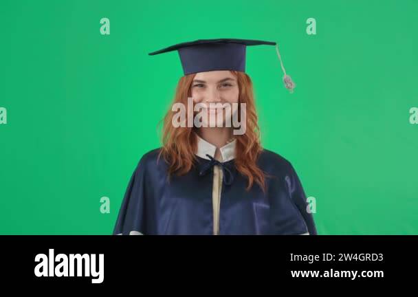 graduation online, girl in academic clothes with diploma smiling and ...