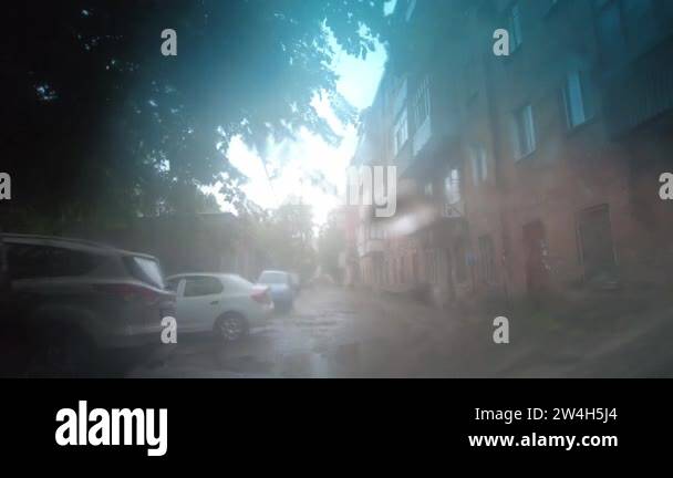 blurred background with rain. damp and cold weather. rain and puddles ...