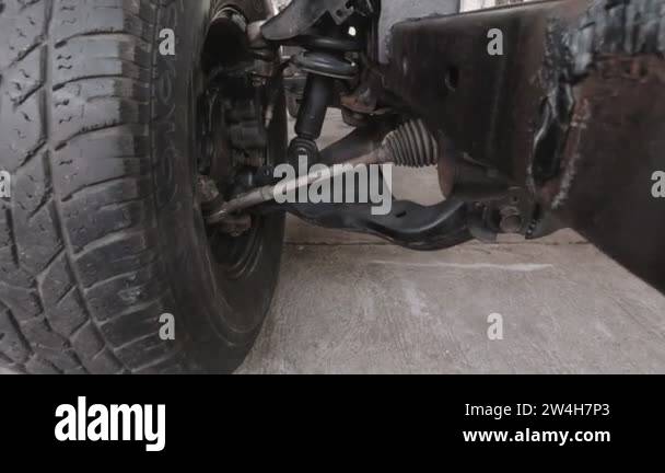 Car Suspension System Including Wheel and Tire and Lower Arm and Shock ...