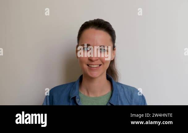 4K footage with emotions of person. Young Caucasian European woman ...