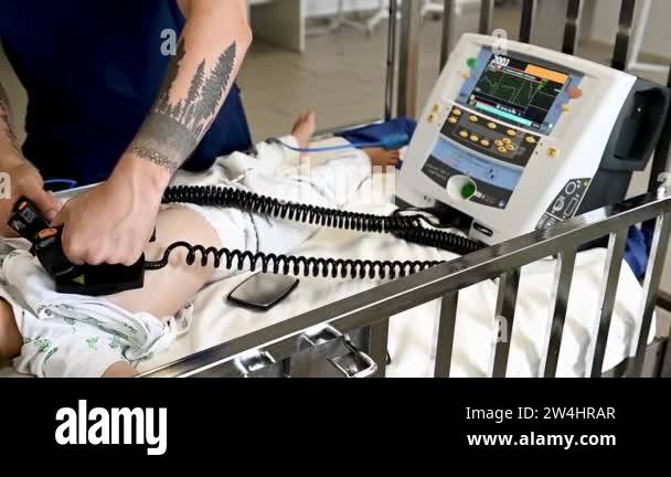 Doctor give resuscitation to a male patient in the emergency room ...