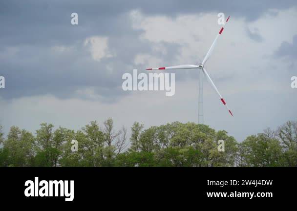 Building process of wind energy power tower, windmill under ...