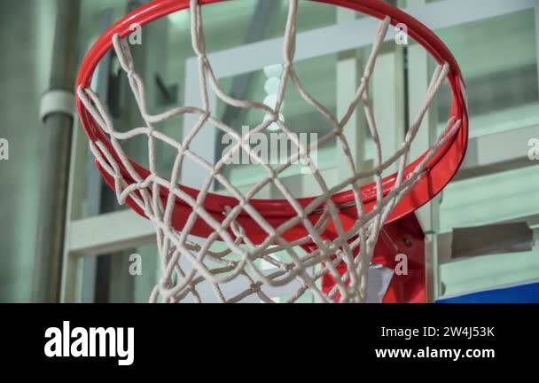 A basketball hits the rim but doesn't fall through the hoop. Pupils are ...