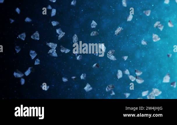 Flying many asteroids in deep space background. Broken splash explosion ...