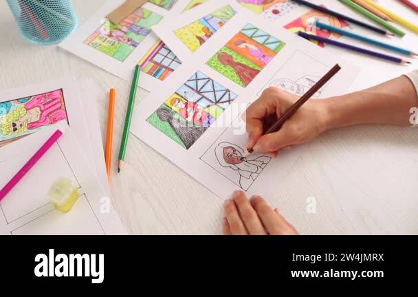 A woman draws a color storyboard for a film or cartoon. An animation ...