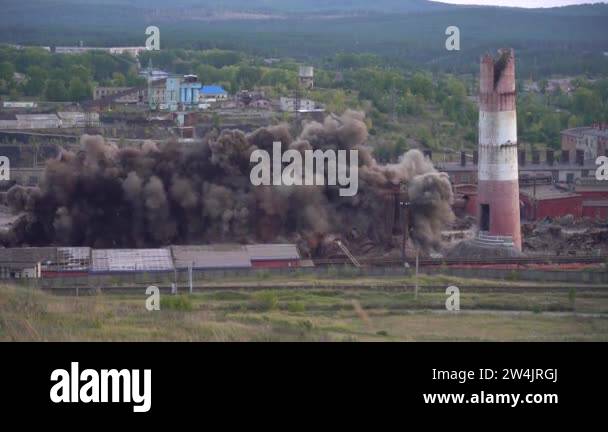 Explosion of old structures. The collapse of an obsolete industrial ...
