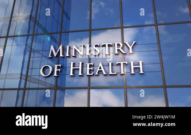 Ministry of Health on glass building. Mirrored sky and city modern ...
