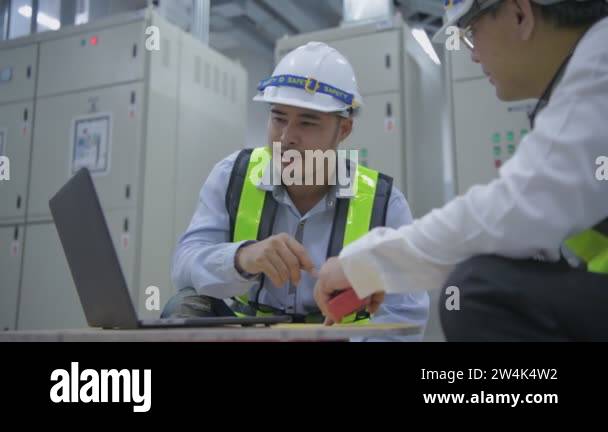 Engineer concept. The employee is checking the generator. 4k Resolution ...