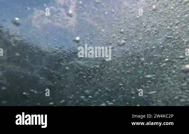 Air bubbles in the sea under water rise upward. Water background Stock ...