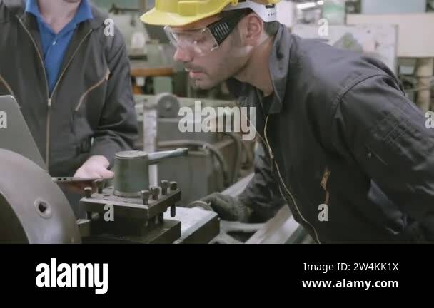 Team engineer working looking laptop computer, two man planning project ...