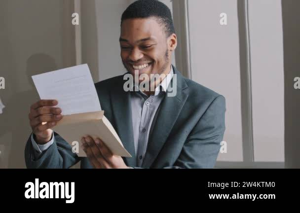 Smiling African stylish young guy black man businessman in modern ...