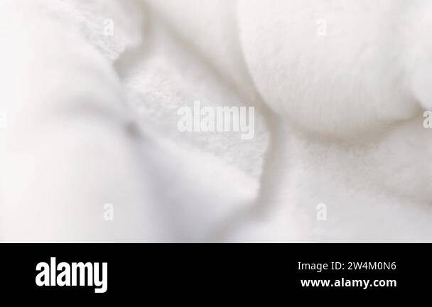 White fluffy fur coat texture, warm winter clothing, luxury textile and ...