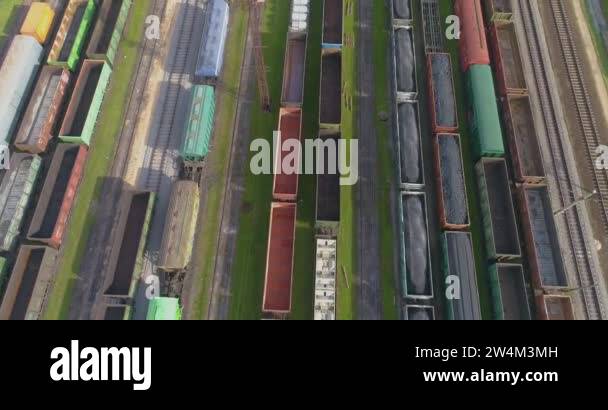 Flying over freight trains. Railroad trains top view. Industrial ...