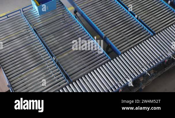 Plastic Crate With Parts at Conveyor System in Distribution Warehouse ...