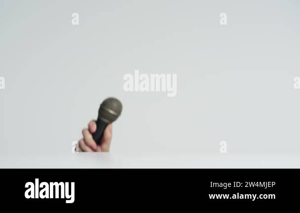 Raising microphone Stock Videos & Footage - HD and 4K Video Clips - Alamy