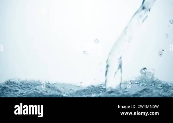 Freshness of a clear blue liquid on white background. Brilliant stream ...