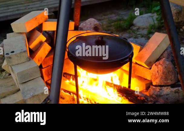 Campfire cooking large cast iron Stock Videos & Footage - HD and 4K ...