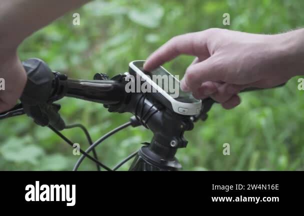 GPS device on mountain bike. Cycling GPS computer. Planning route ...
