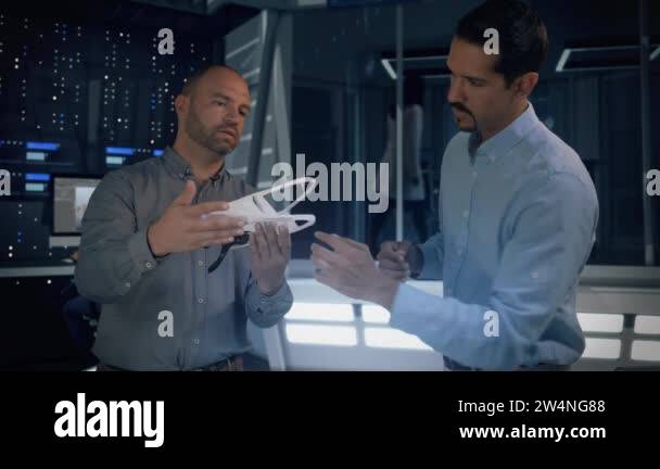 Professional Engineer and Designer Work with a Futuristic Concept Face ...