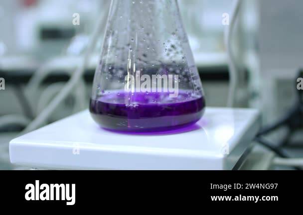 Magnetic mixer stirrer with fast moving stir bar for mixing liquid at ...