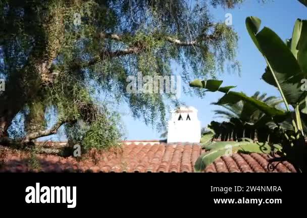 Mexican colonial style suburban, hispanic house exterior, green lush ...
