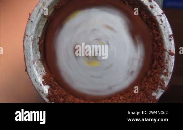 Close-up of the grinding process on the kitchen device with rotational ...