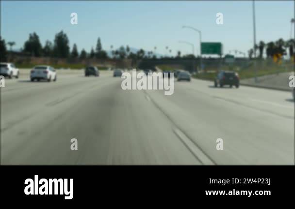Driving on intercity freeway in Los Angeles, California USA. Defocused ...