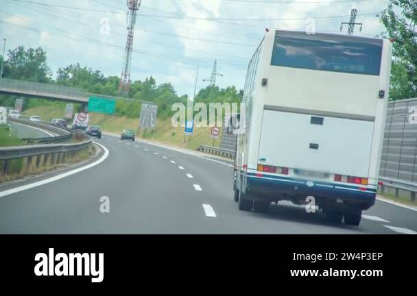 Car driving behind bus Stock Videos & Footage - HD and 4K Video Clips ...