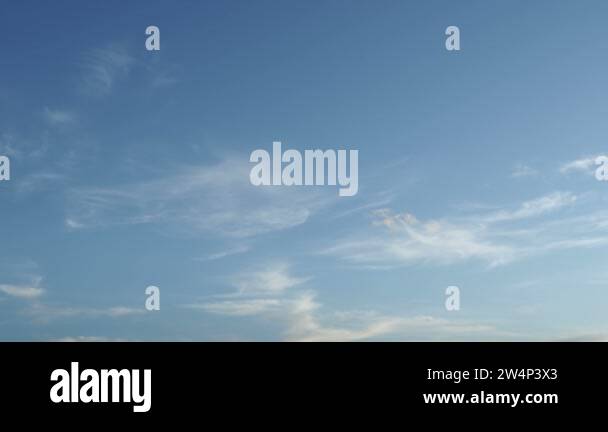 Beautiful blue sky with clouds background. Beautiful cloud flying in blue sky. Rolling puffy ...