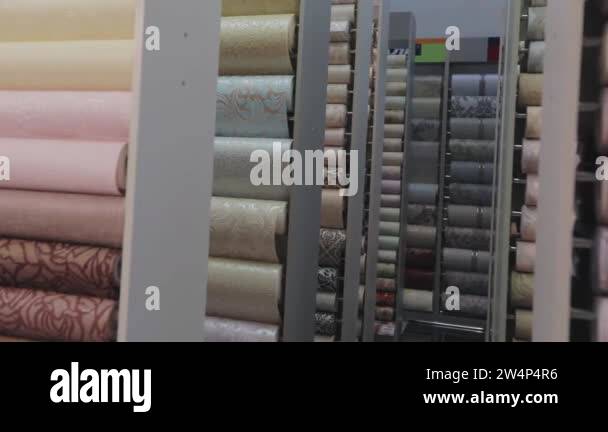 Stands with new samples. Rolls with wallpaper. Stands with rolls of ...