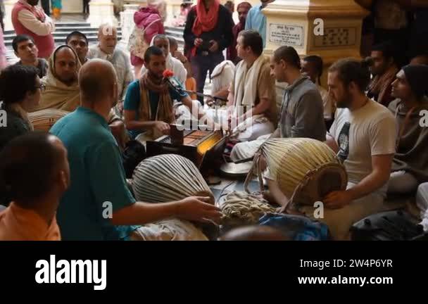 VRINDAVAN, INDIA - 11 MARCH 2017: Hare Krishna playing Kirtan chants in ...