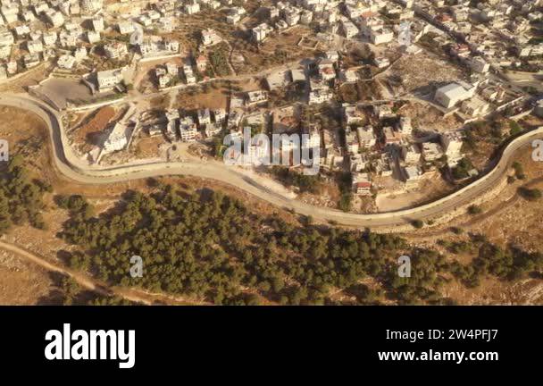 Palestinian refugees Camp Anata Behind security wall Aerial viewclose ...
